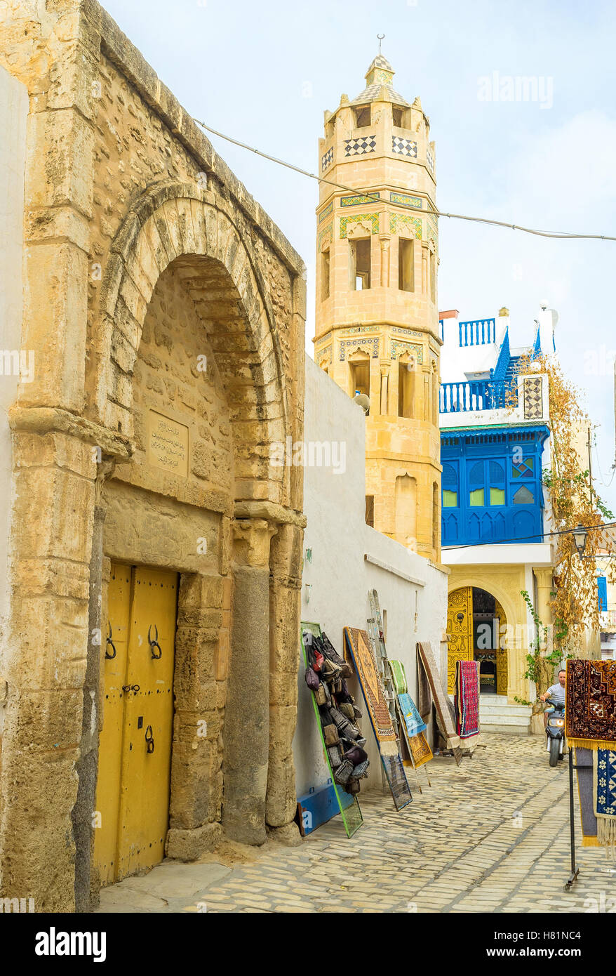 The old tiny mosque with the scenic octagonal minaret, decorated with ...