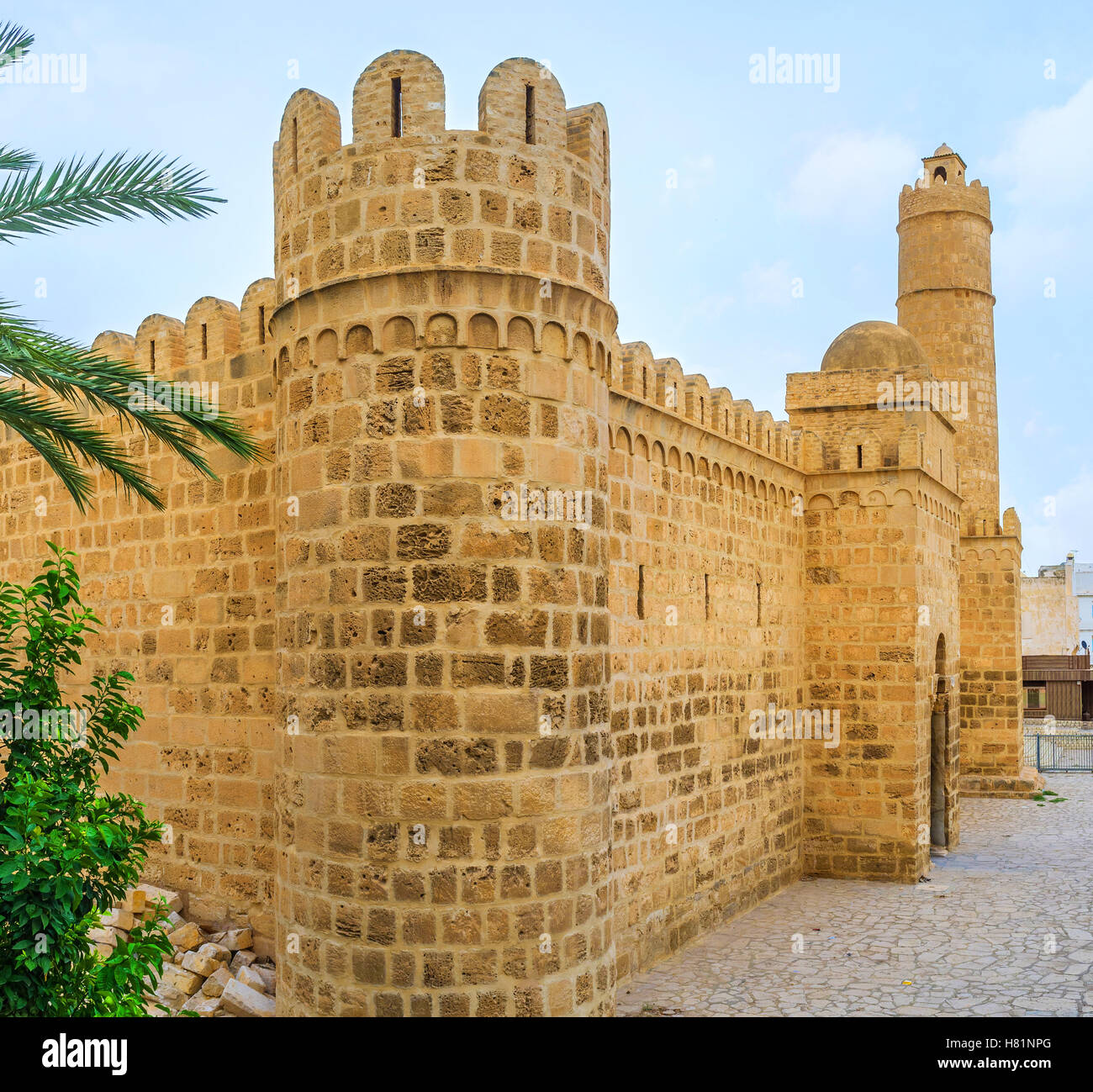 The round corner tower of the defensive fortress of Ribat, located in ...