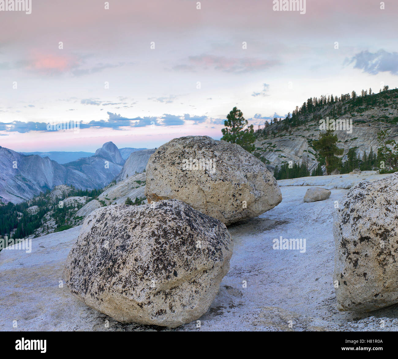 Granite boulders and Half Dome at Olmsted Point, Yosemite National Park ...