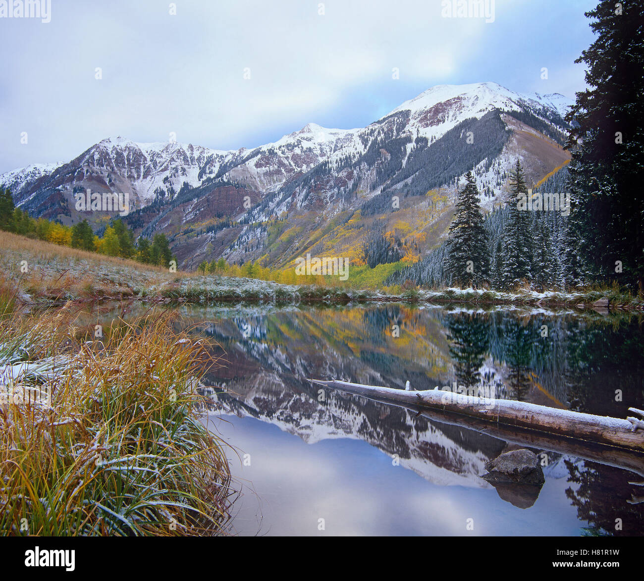 Pond and mountains after light snowstorm, Maroon Bells-Snowmass ...