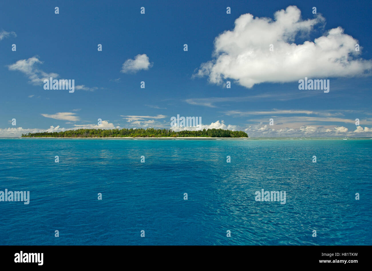 Clouds above sea and coral atoll, Alphonse Island, Seychelles Stock ...
