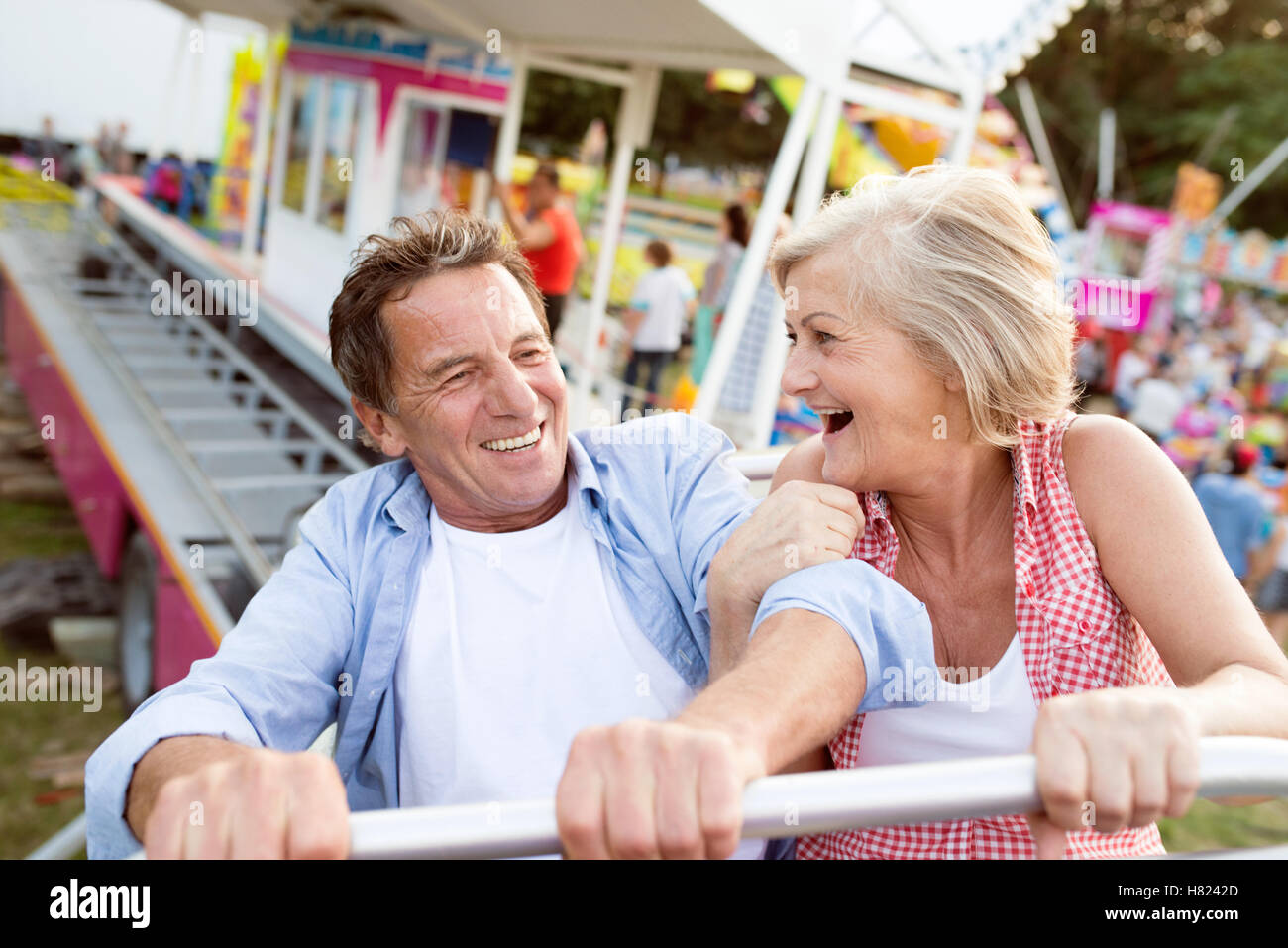 Couple theme park ride hi-res stock photography and images - Alamy