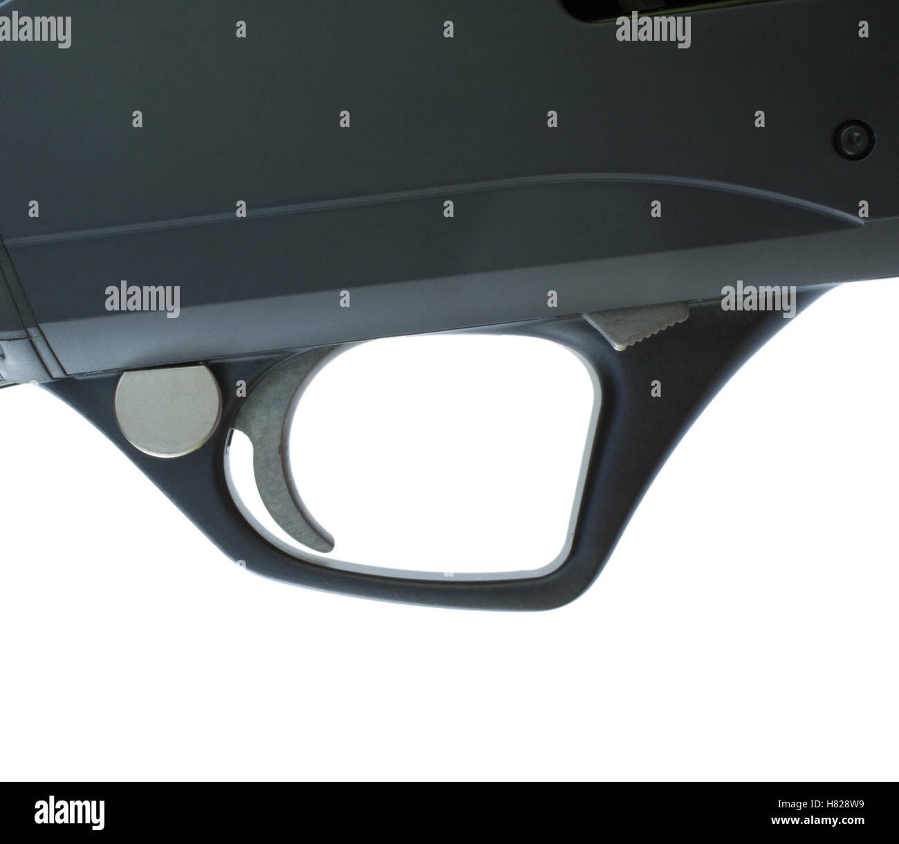 Trigger on a shotgun along with its safety Stock Photo - Alamy