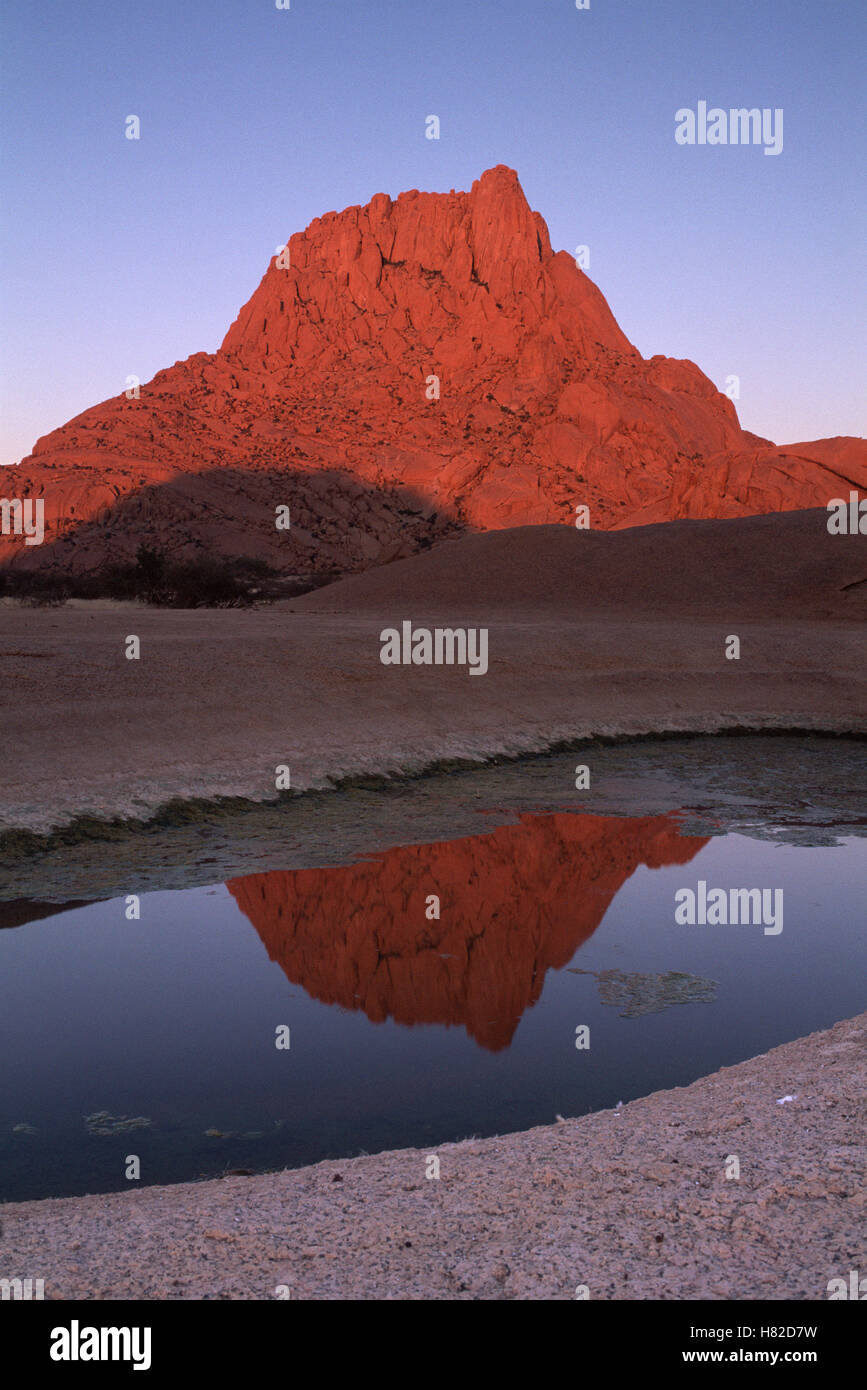 Granite reflection in rock pool, Spitzkop, Damaraland, Namibia Stock ...