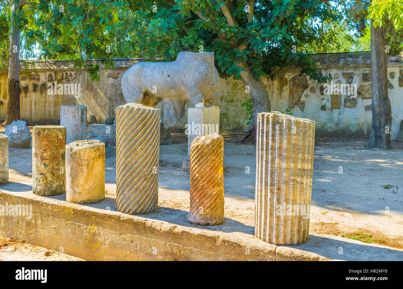 The antuque columns of different stone and shape in archaeological site ...