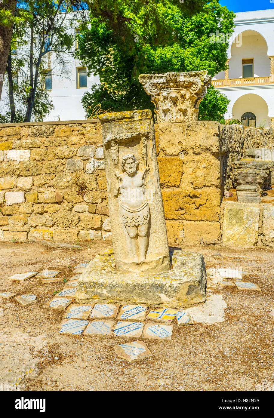 The preserved sculpture of ancient God in archaeological site, Carthage ...