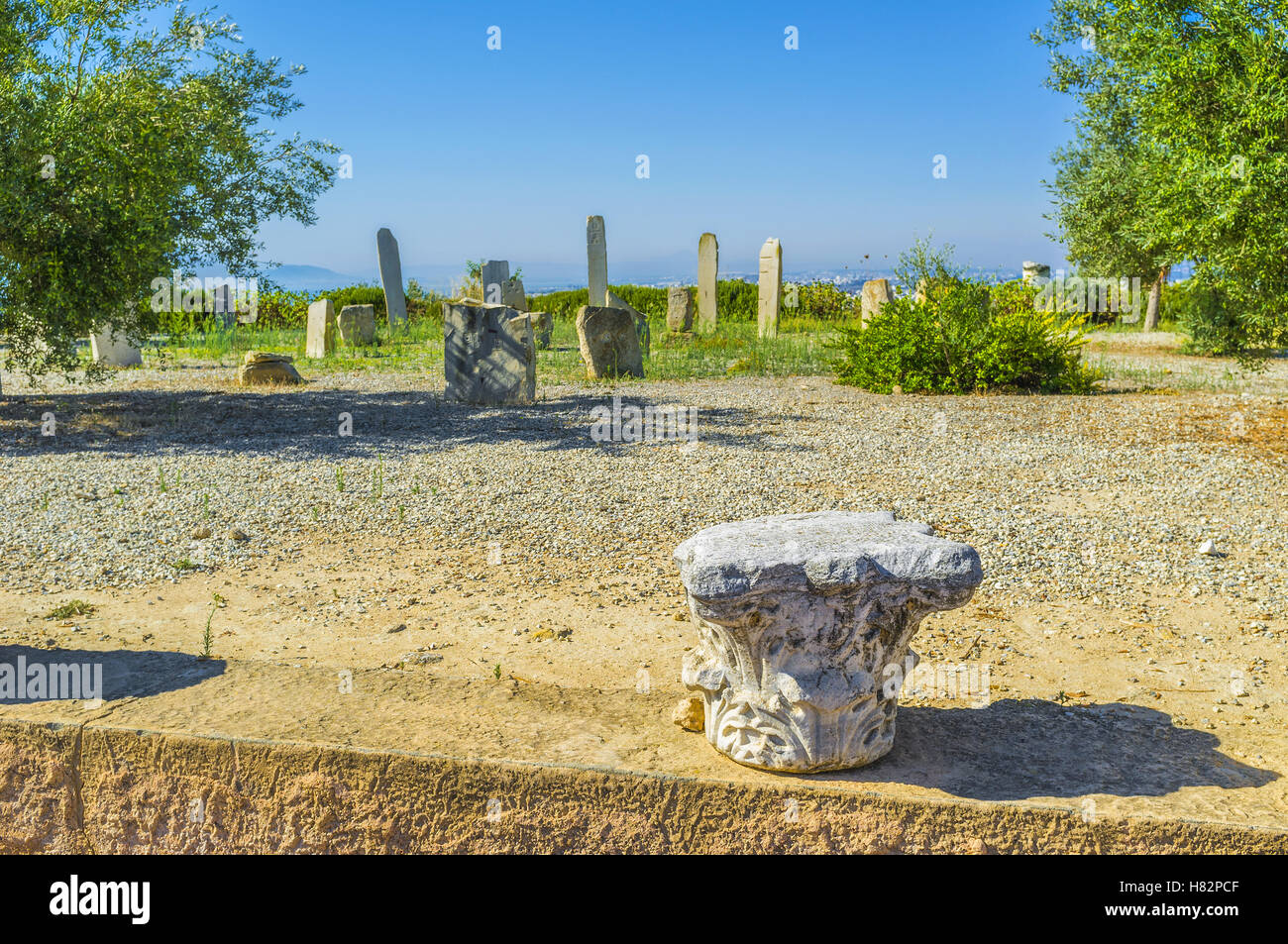 The ruined capital of the marble column in archaeological site of ...