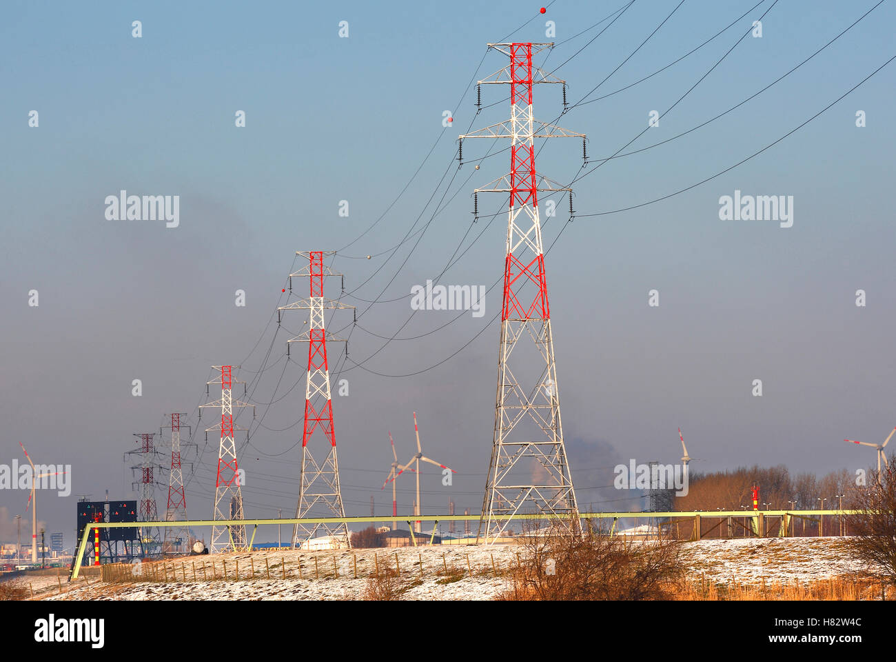 Windmills with electricity pylons and power lines, Belgium, Doel ...