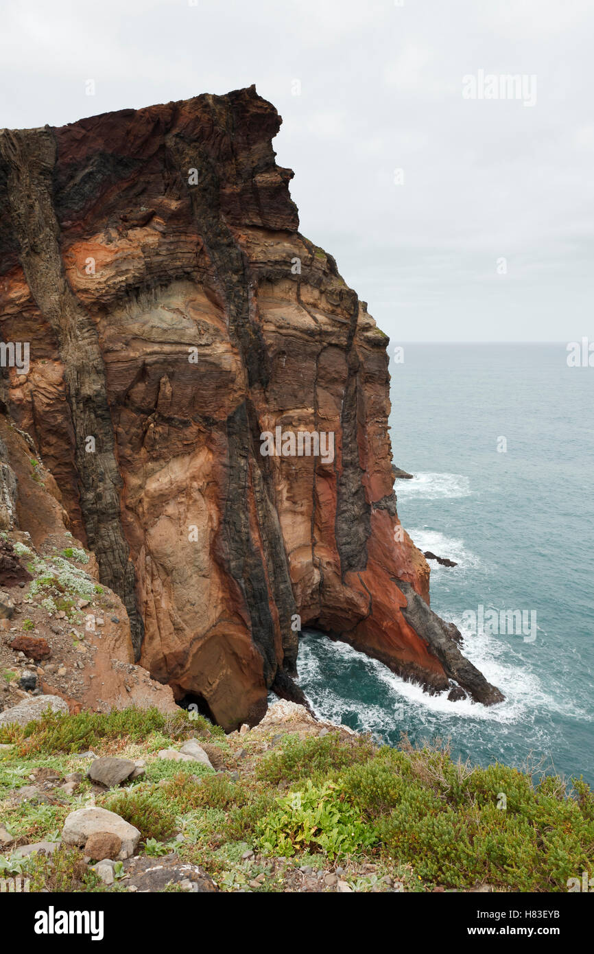 Steep cliffs with obvious volcanic intrusions, Madeira, Portugal Stock ...
