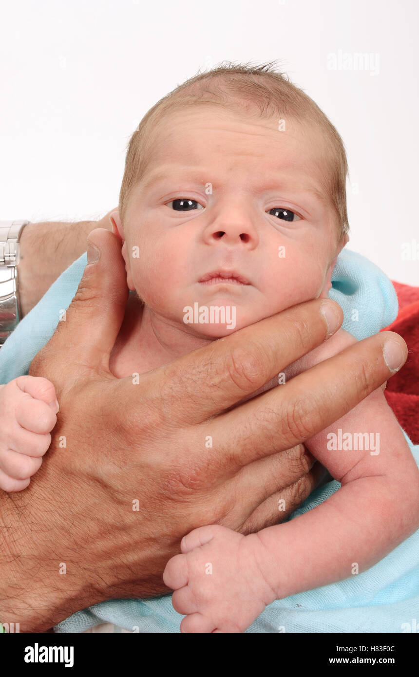 Baby in blanket hi-res stock photography and images - Alamy