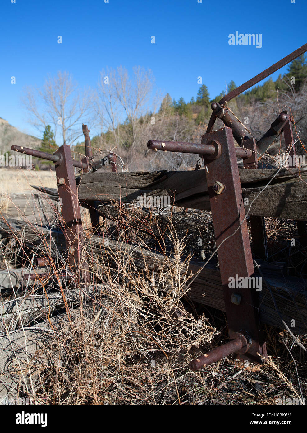 Broken down machinery left abandoned at a ghost town Stock Photo - Alamy