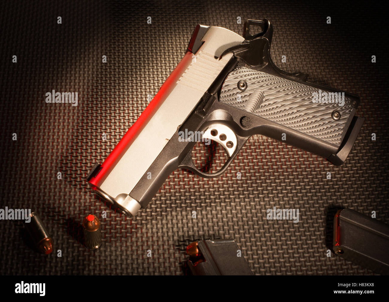 Silver handgun hi-res stock photography and images - Alamy