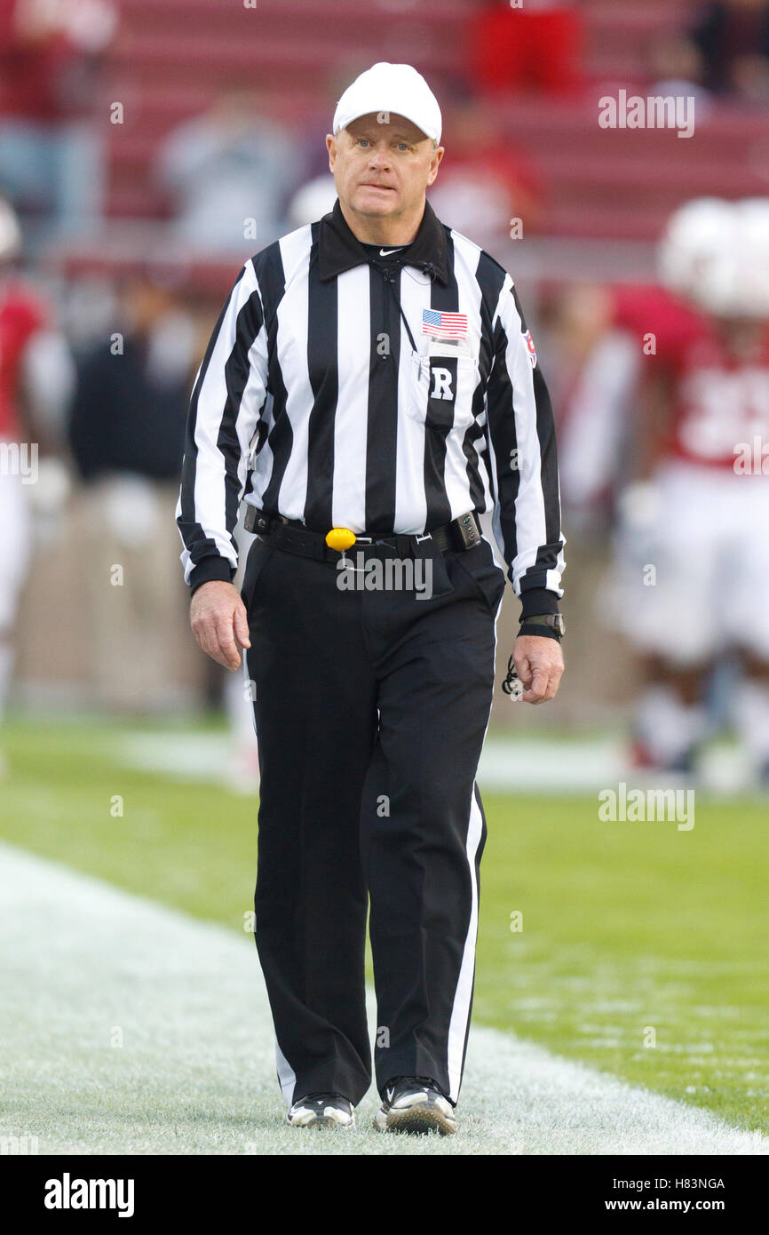 Nov 12, 2011; Stanford CA, USA; NCAA referee Jack Folliard walks along ...