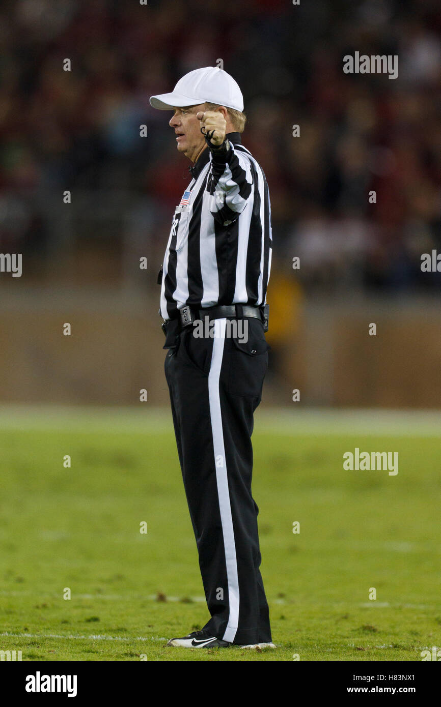 Nov 12, 2011; Stanford CA, USA; NCAA referee Jack Folliard signals for ...