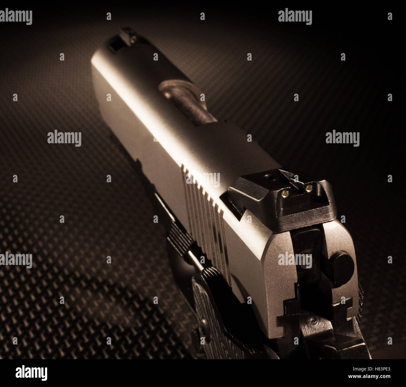 view from the rear top of a semi automatic handgun Stock Photo - Alamy