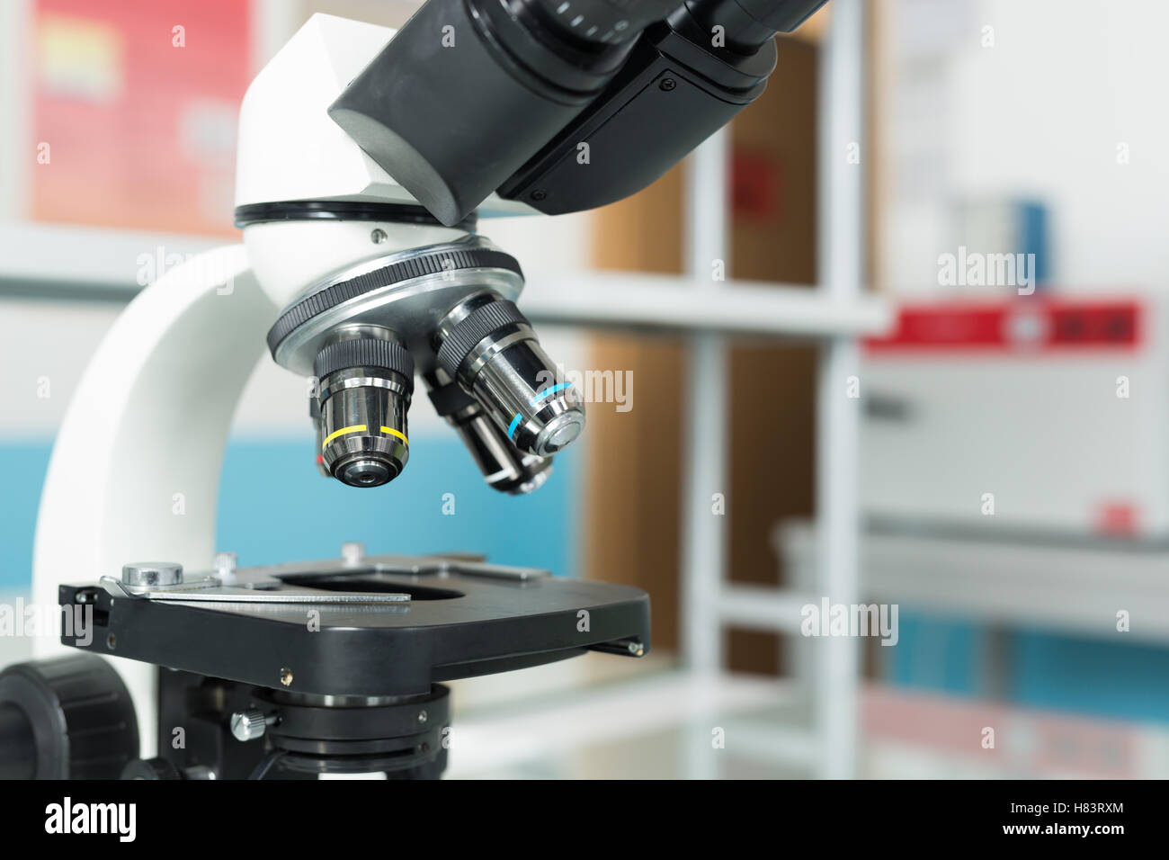 Scientist hands with microscope close-up shot in the laboratory Stock ...