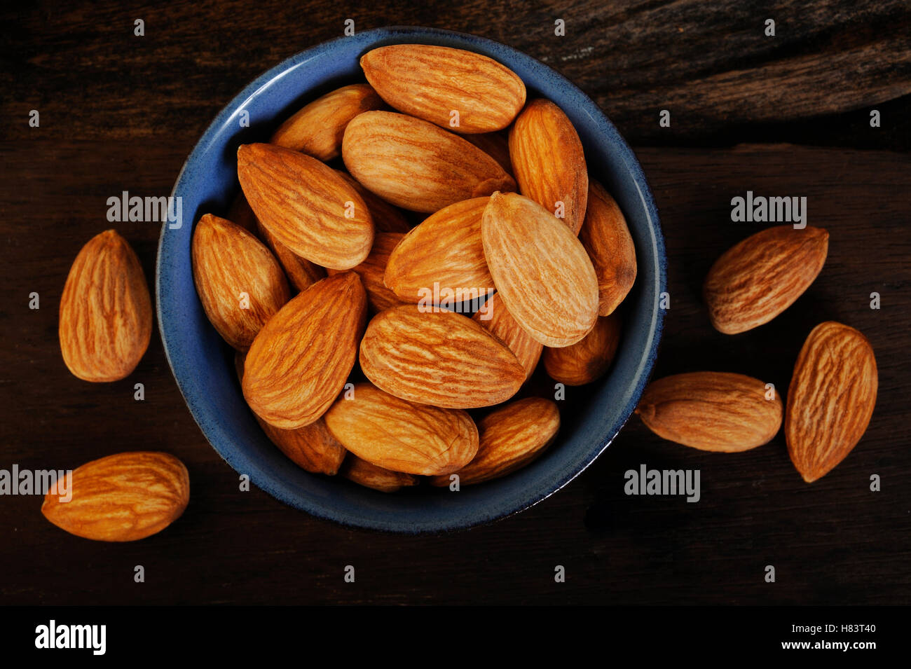almond nuts in bowl Stock Photo - Alamy
