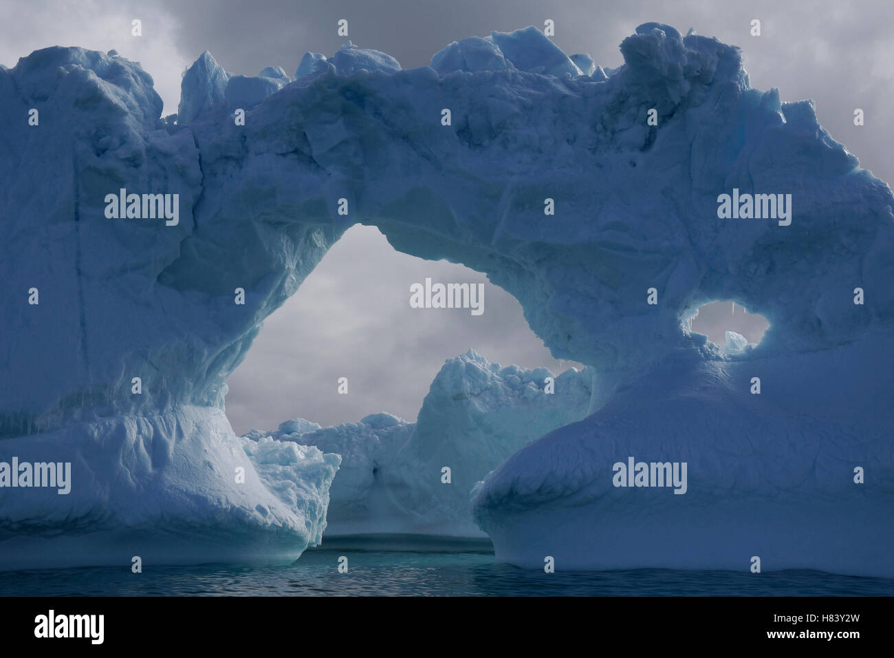 Ice arch in glacial fjord, Greenland, Denmark Stock Photo - Alamy