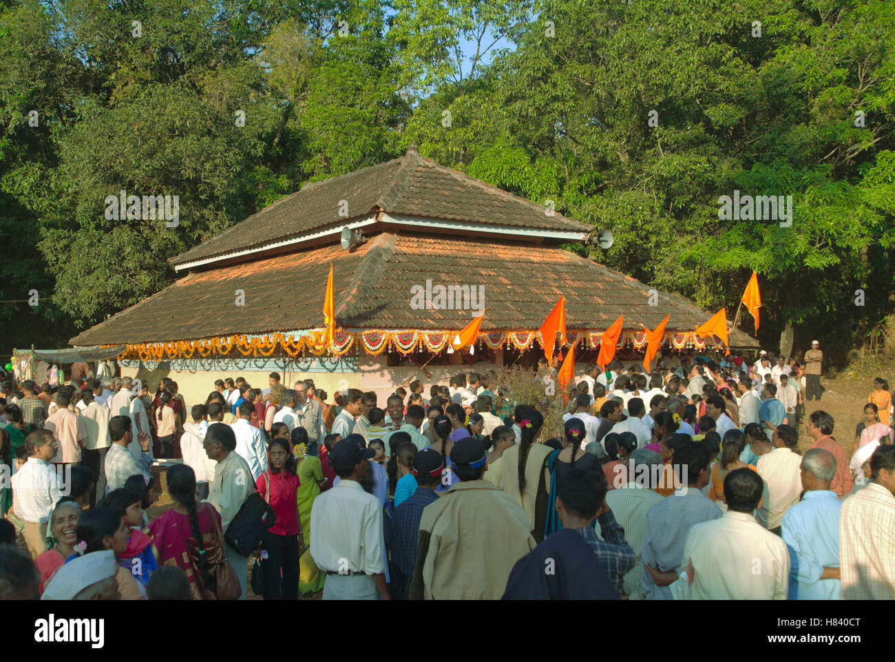 Religious tradition called ‘Bagada’. Devotees get hooked and hung Stock ...