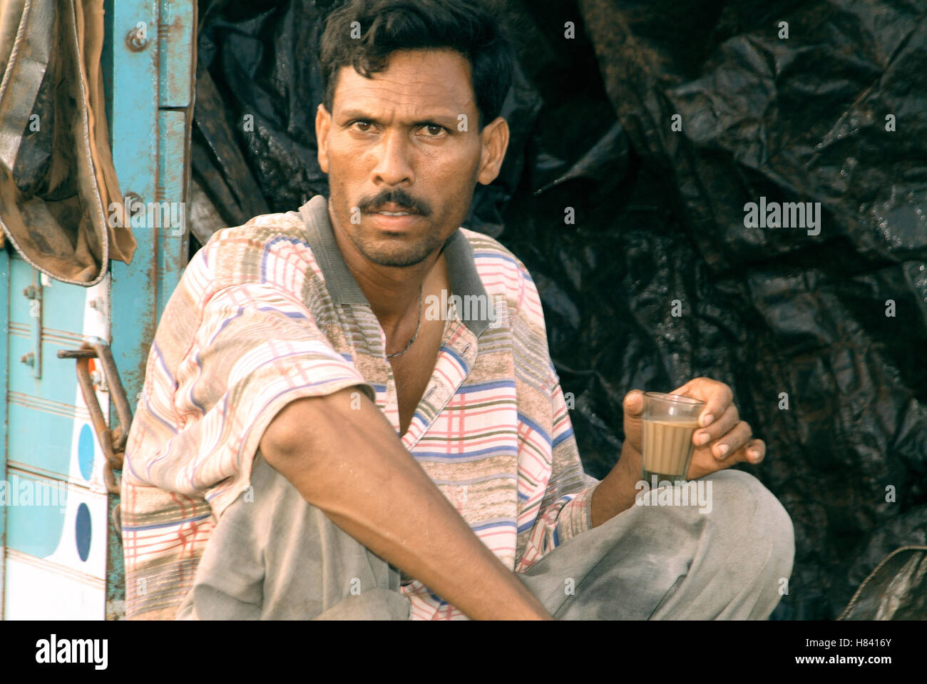 Rural man having tea in Maharashtra, India Stock Photo - Alamy