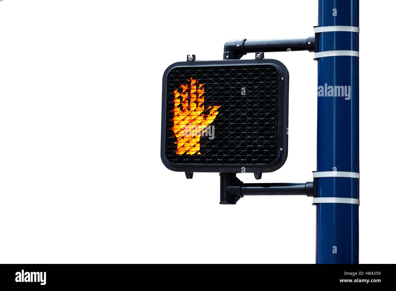 Hand symbol on lighted pedestrian crossing sign mounted to a pole ...