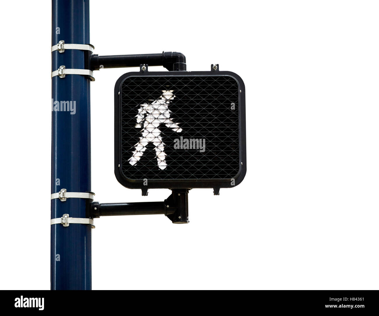Person walking symbol on lighted pedestrian street crossing sign ...