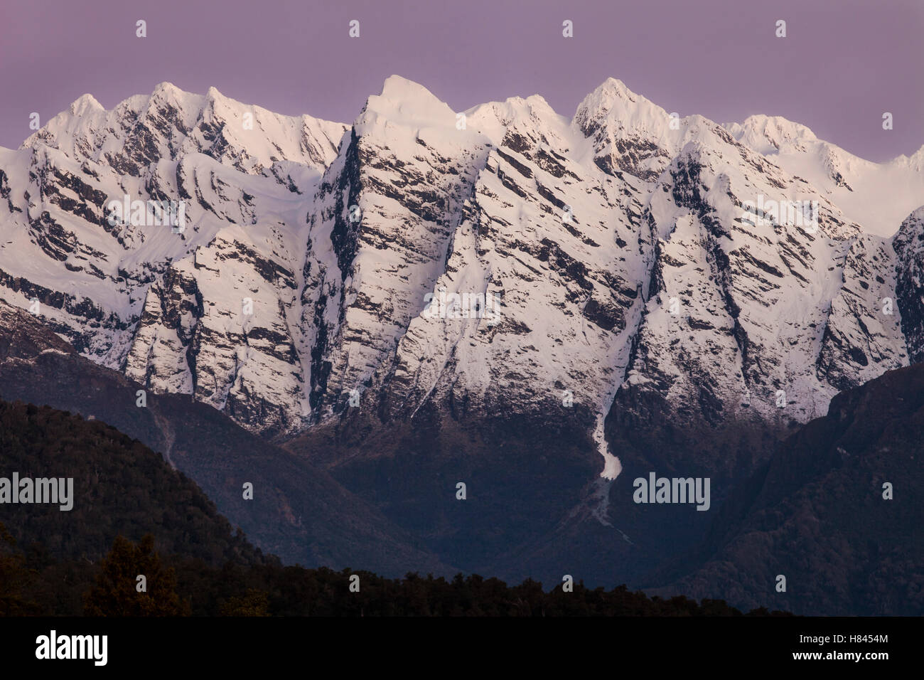 Snow-covered peaks, Butler Range, South Island, New Zealand Stock Photo ...