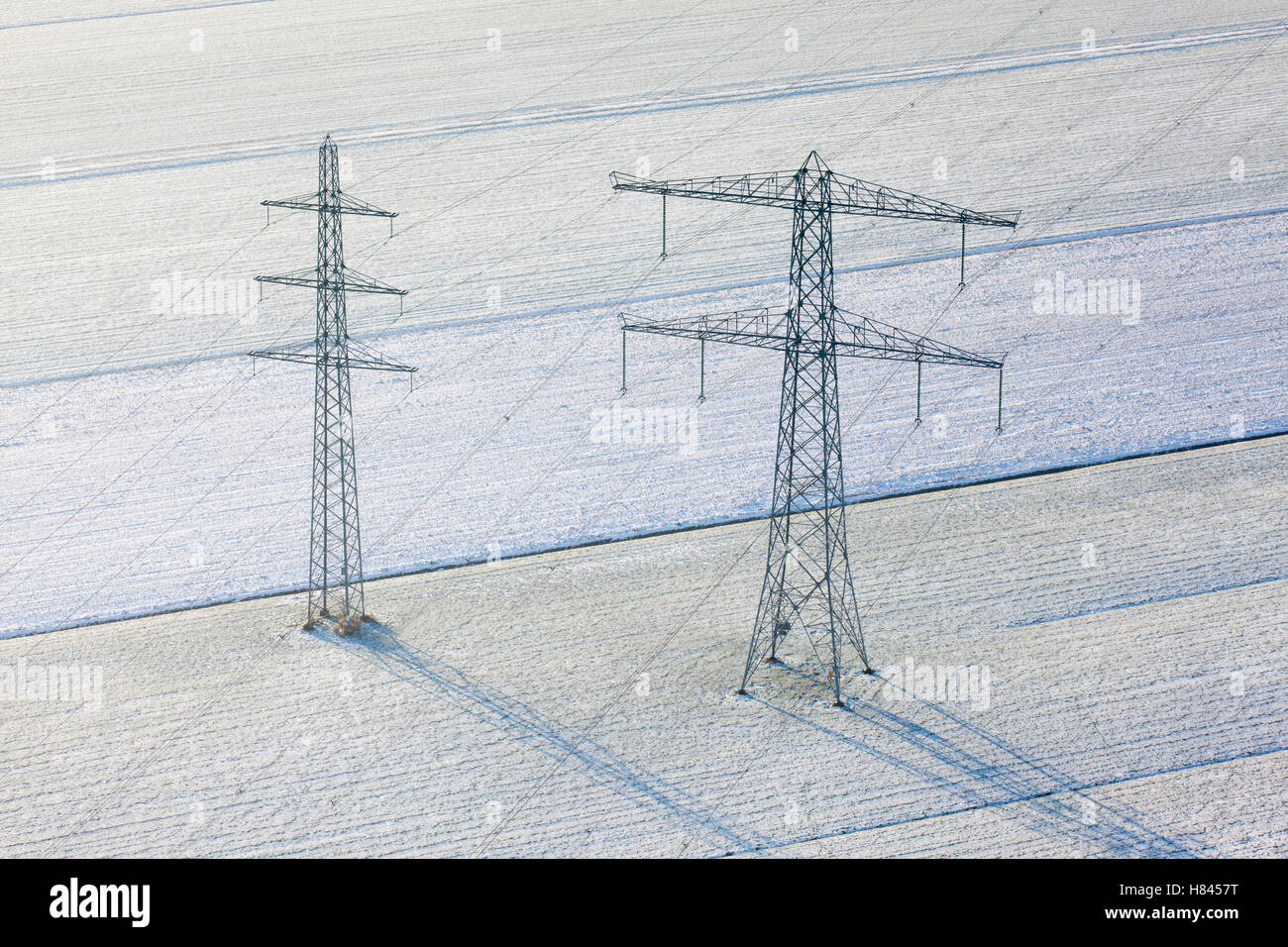 Power lines in snow, Netherlands Stock Photo - Alamy