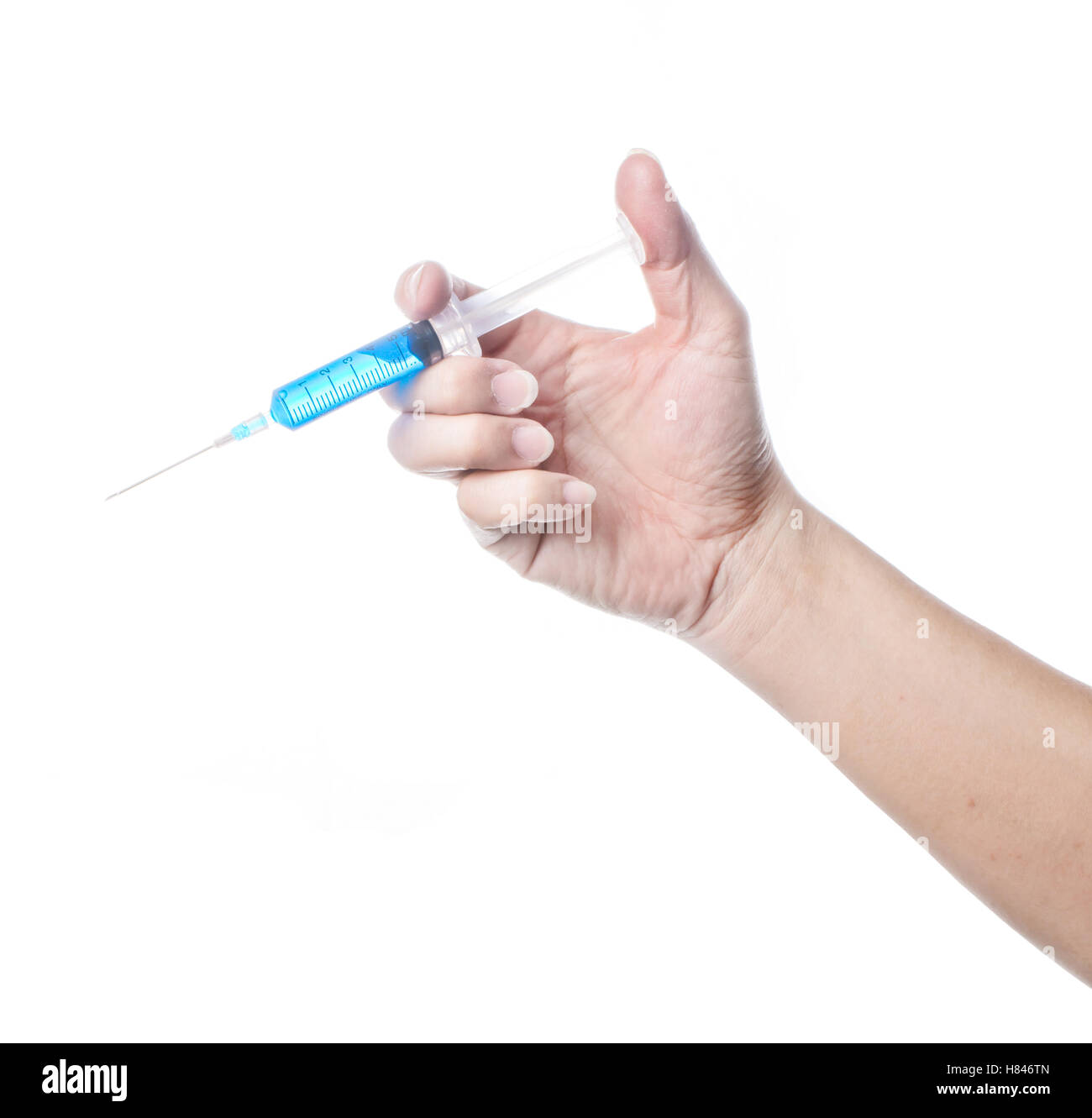 syringe in a hand on white background, isolated Stock Photo - Alamy