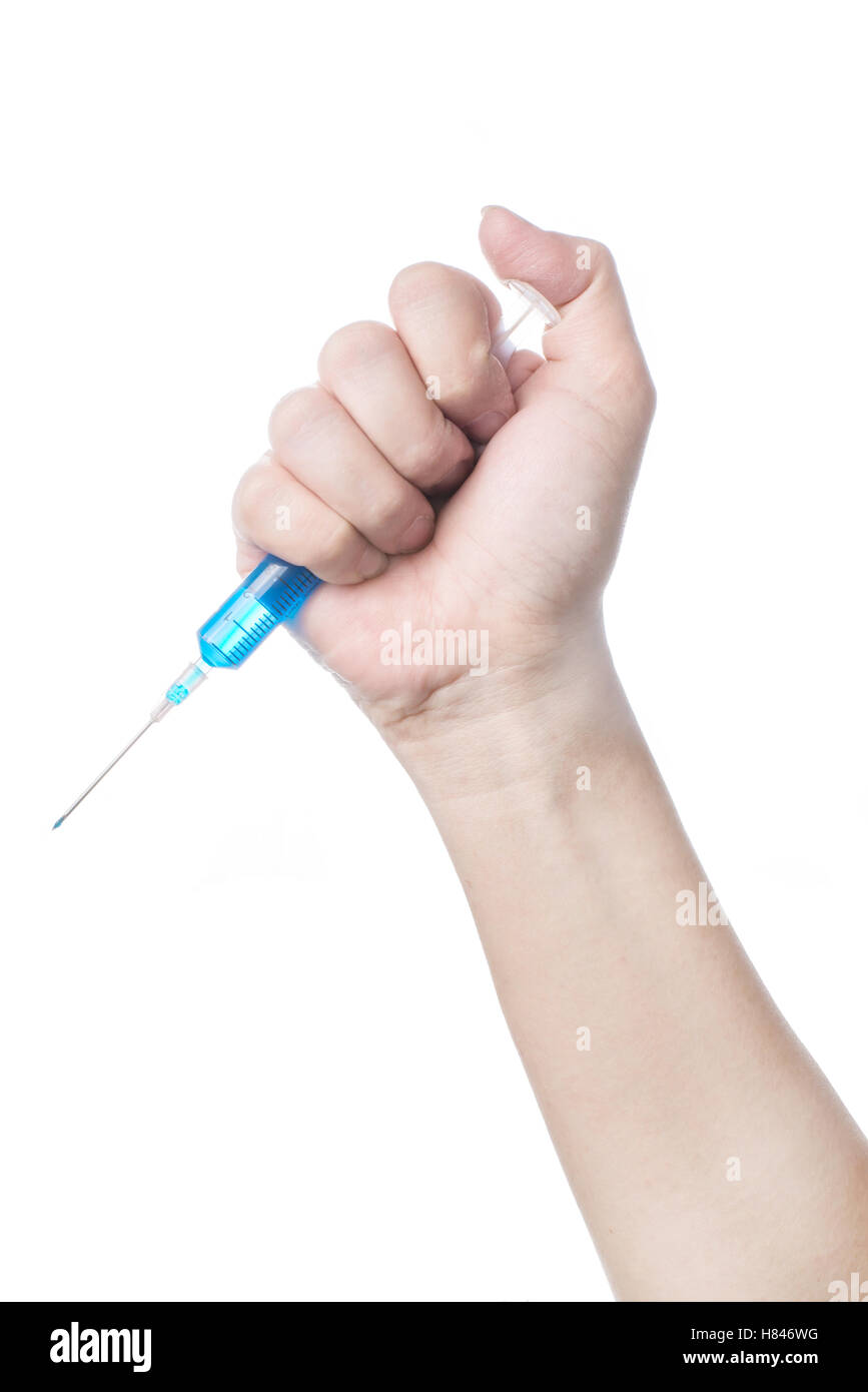 syringe in a hand on white background, isolated Stock Photo - Alamy