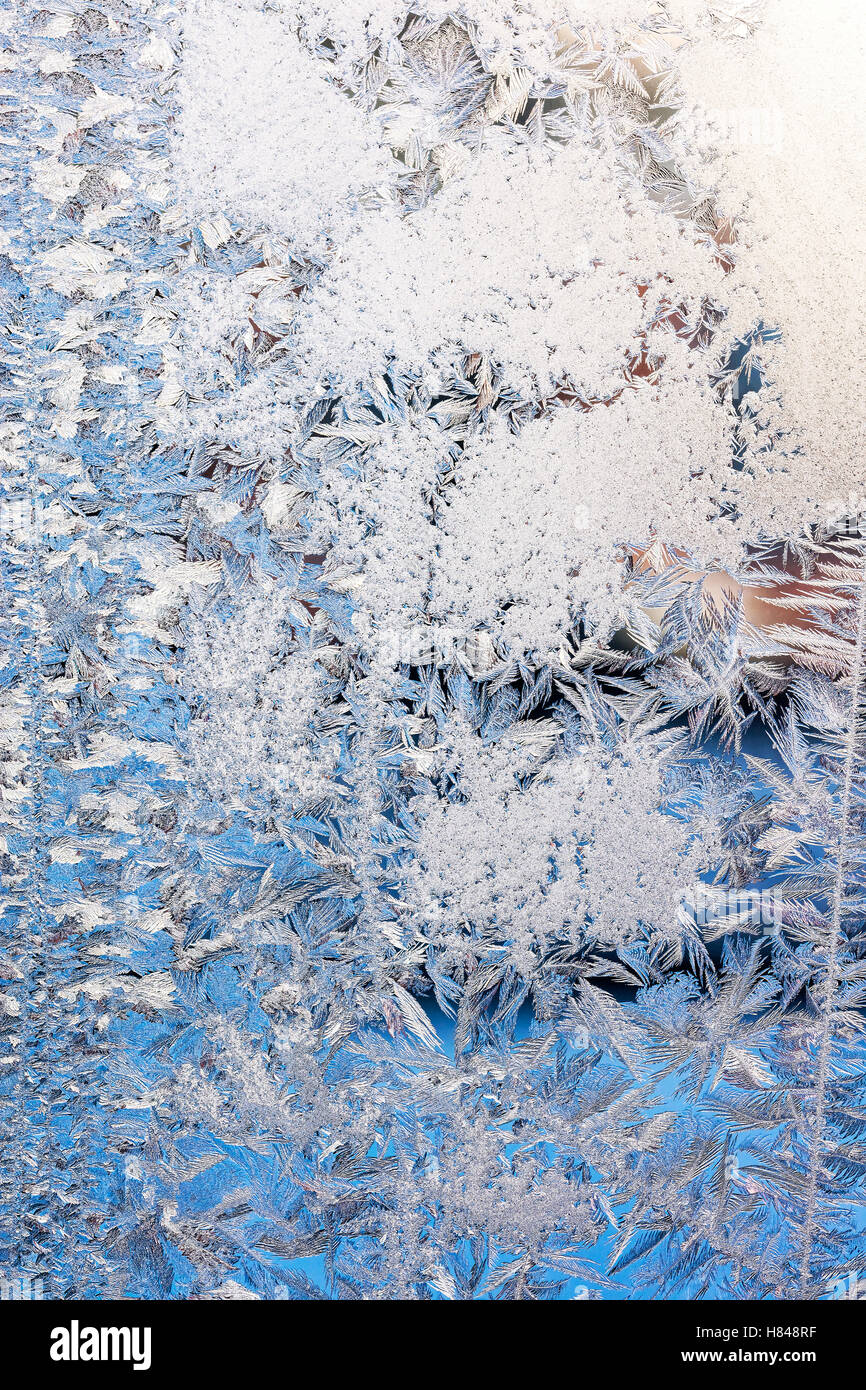 abstract winter texture with frost pattern on frozen window Stock Photo ...
