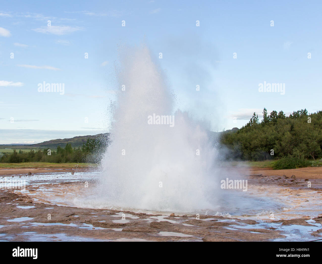 Geyser Strokkur eruption in the Geysir area, Iceland Stock Photo - Alamy