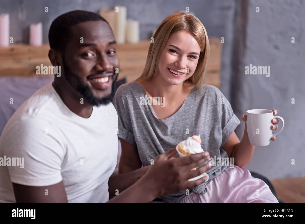 International couple drinking tea together Stock Photo - Alamy