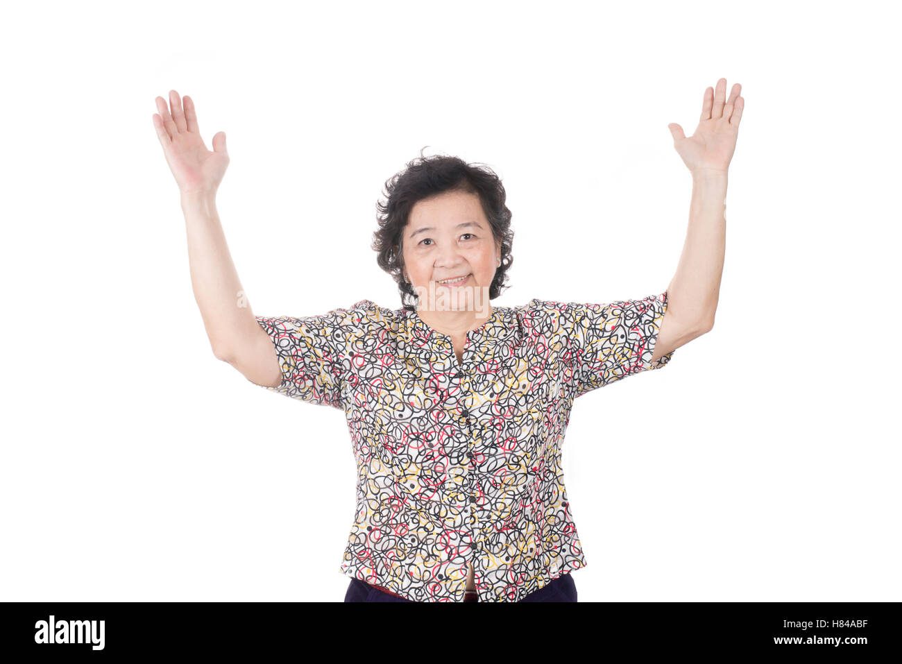 woman holds her arms wide open, imagine the size in the air, isolated ...