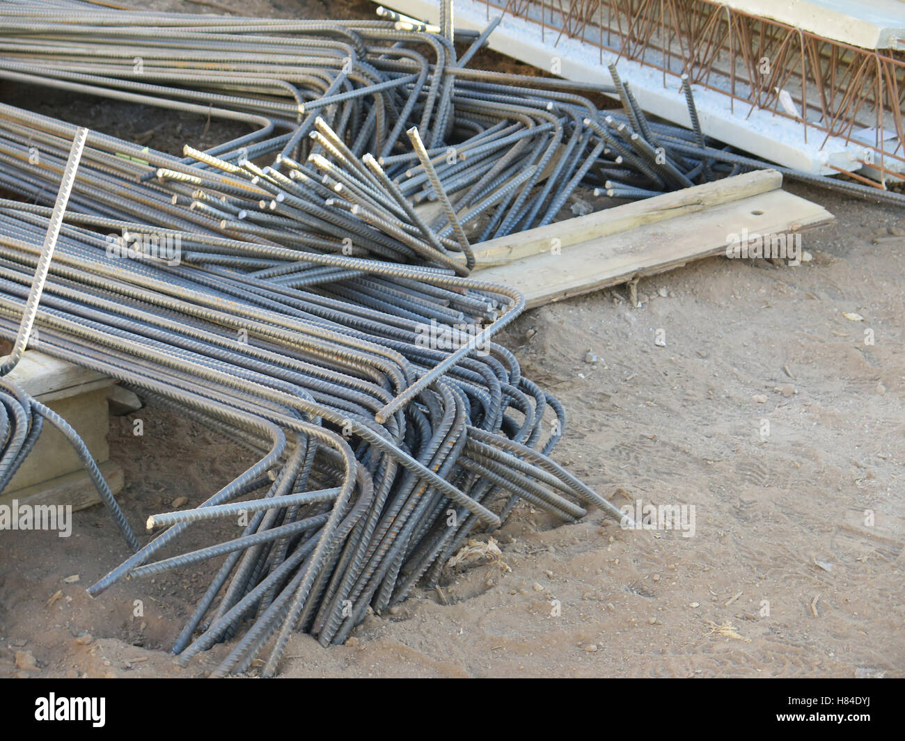 Bent Steel bars for reinforcing concrete pillars Stock Photo - Alamy