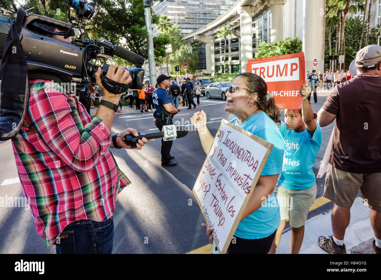 Miami Florida,protesters,signs,Spanish English,protest,2016 ...