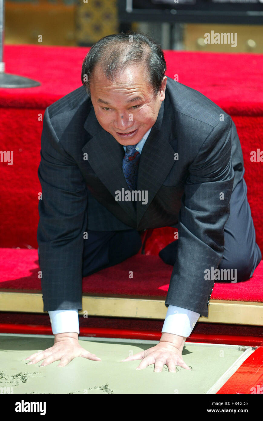 JOHN WOO JOHN WOO HANDPRINTS CEREMONY MANN'S CHINESE THEATRE HOLLYWOOD ...