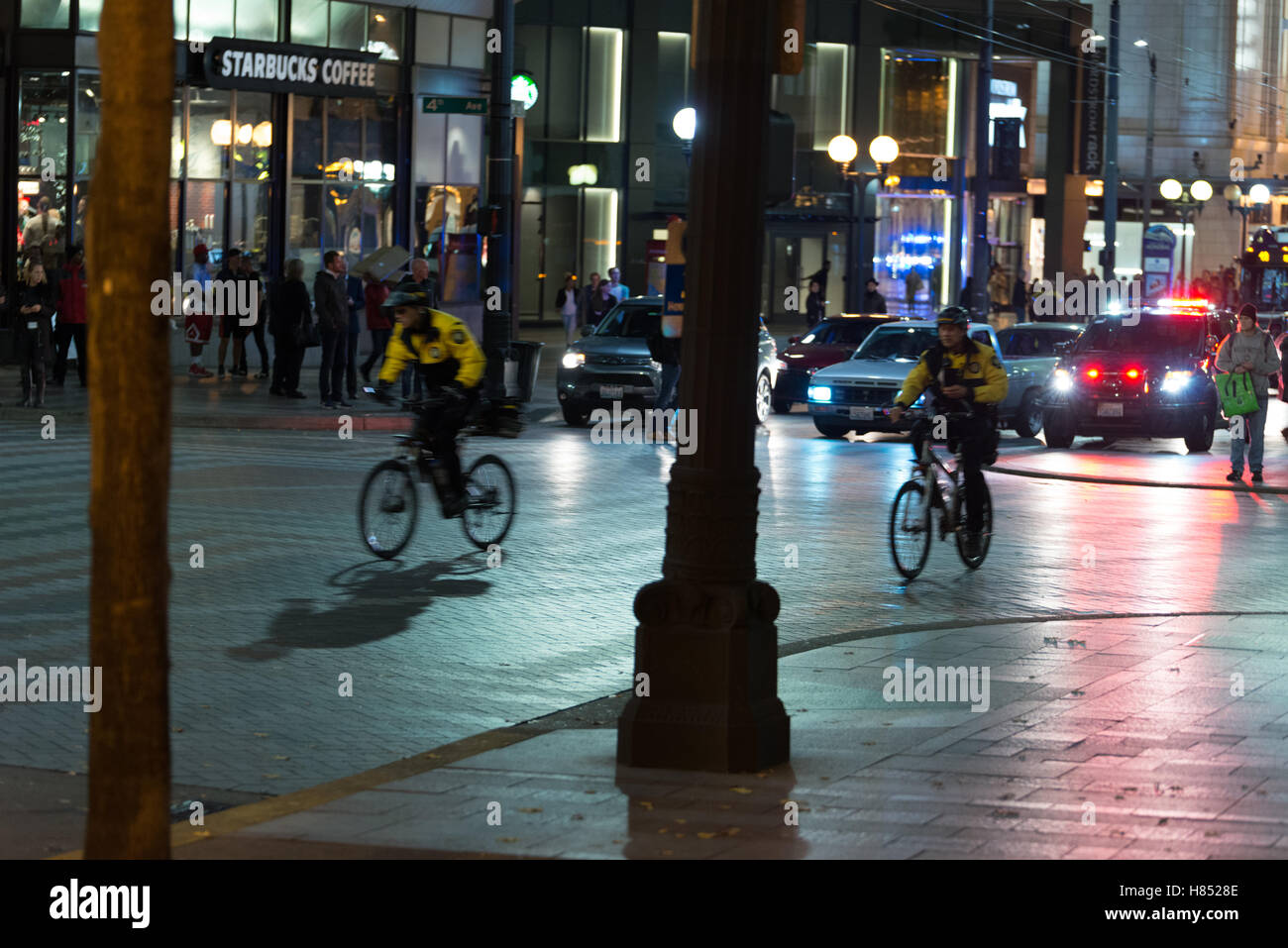 Seattle, USA. 9th Nov, 2016. Two bicycle officers lead the charge of ...