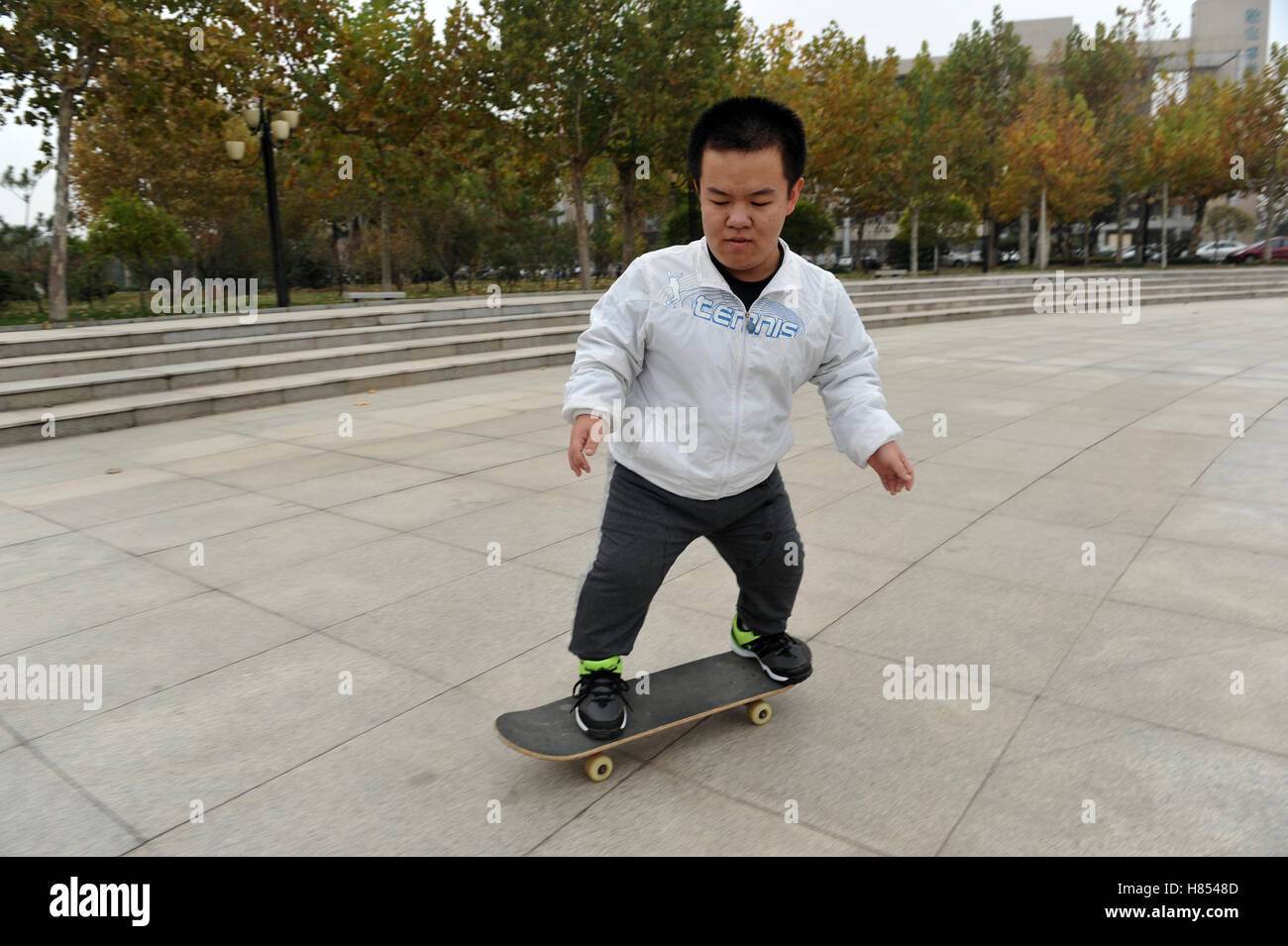 Dwarfism playing hi-res stock photography and images - Alamy