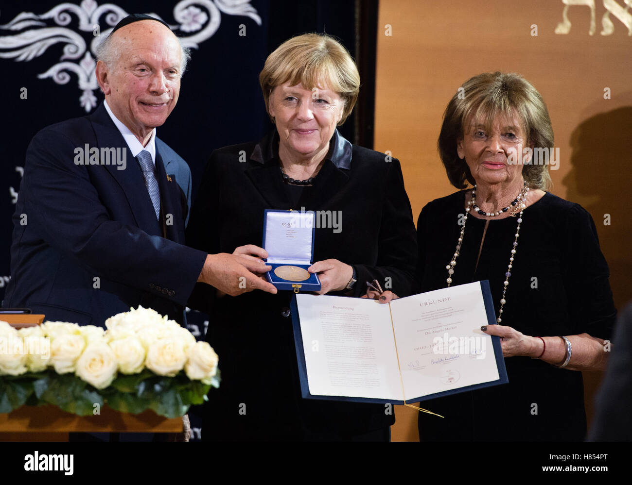 German Chancellor Angela Merkel (CDU) holdingh the award of the of the ...
