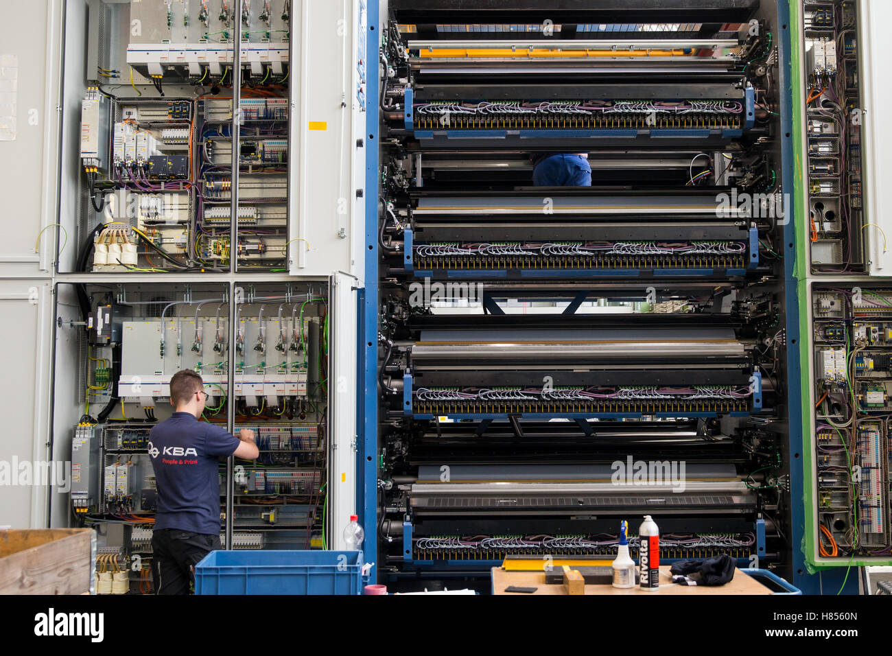 Wuerzburg, Germany. 04th Nov, 2016. An employee of the printing press ...