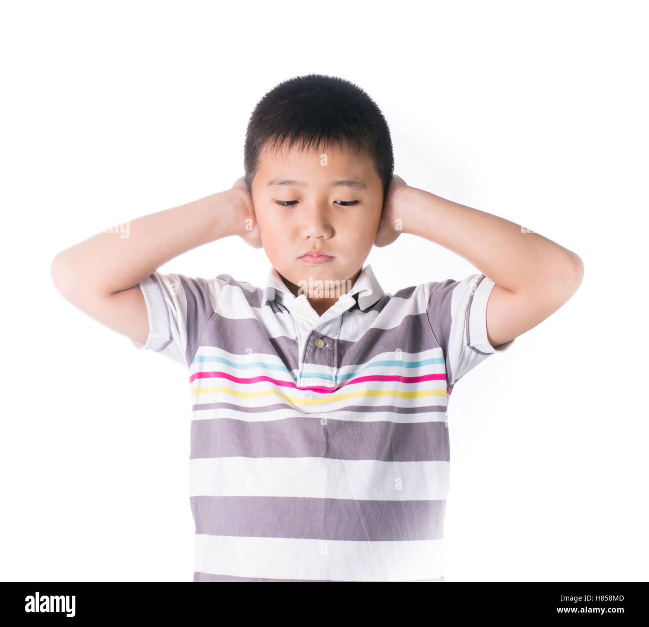 Boy hands off covering ears from loud noise, squeezing head with hands ...