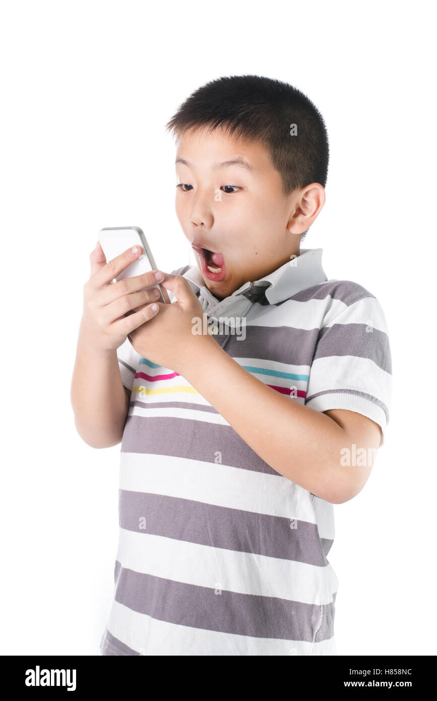 little boy with mobile phone in hand isolated on white background Stock ...