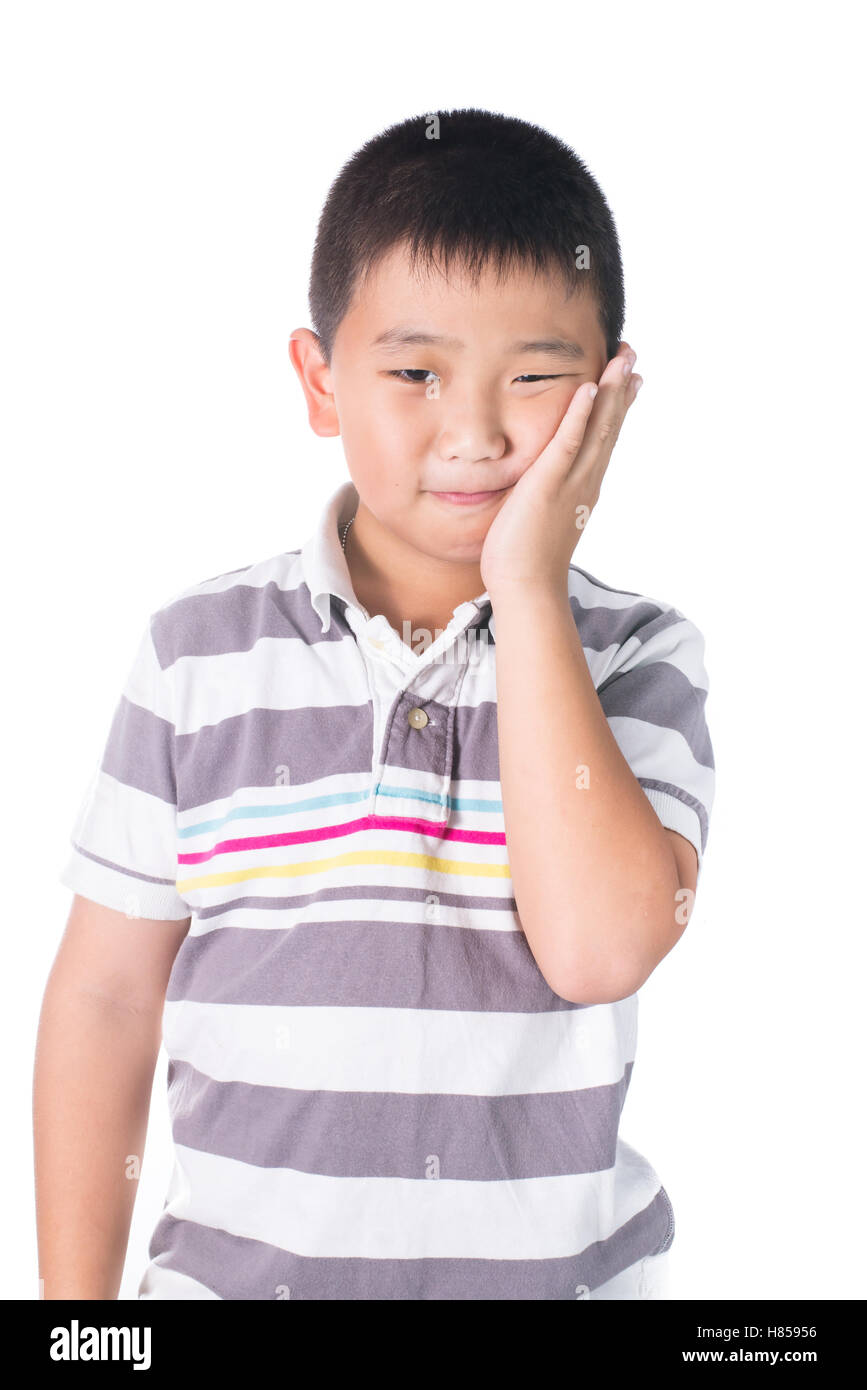 Boy having a toothache holding his face with his hand, isolated on the ...