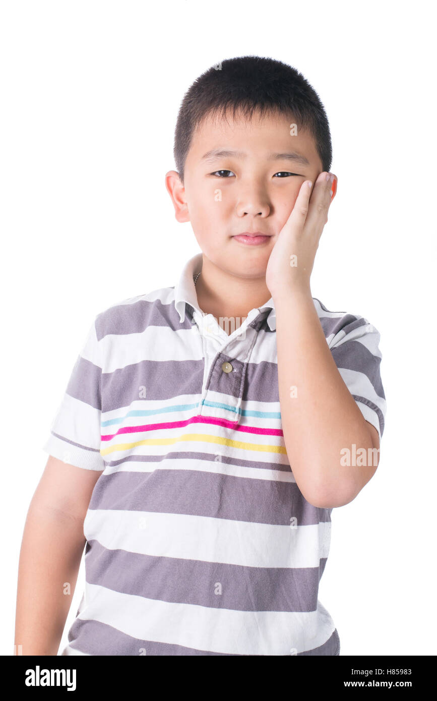 Boy having a toothache holding his face with his hand, isolated on the ...