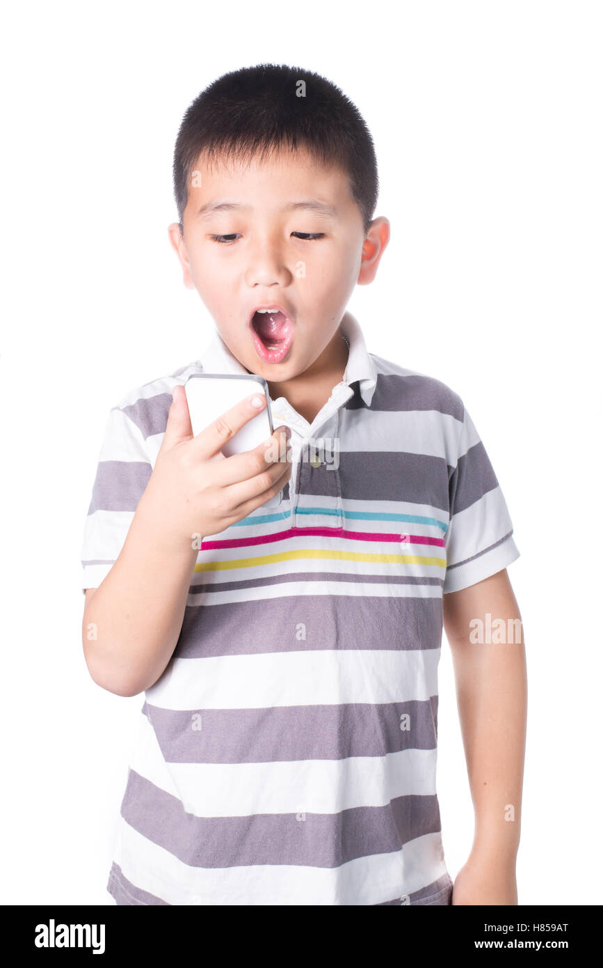 little boy with mobile phone in hand isolated on white background Stock ...