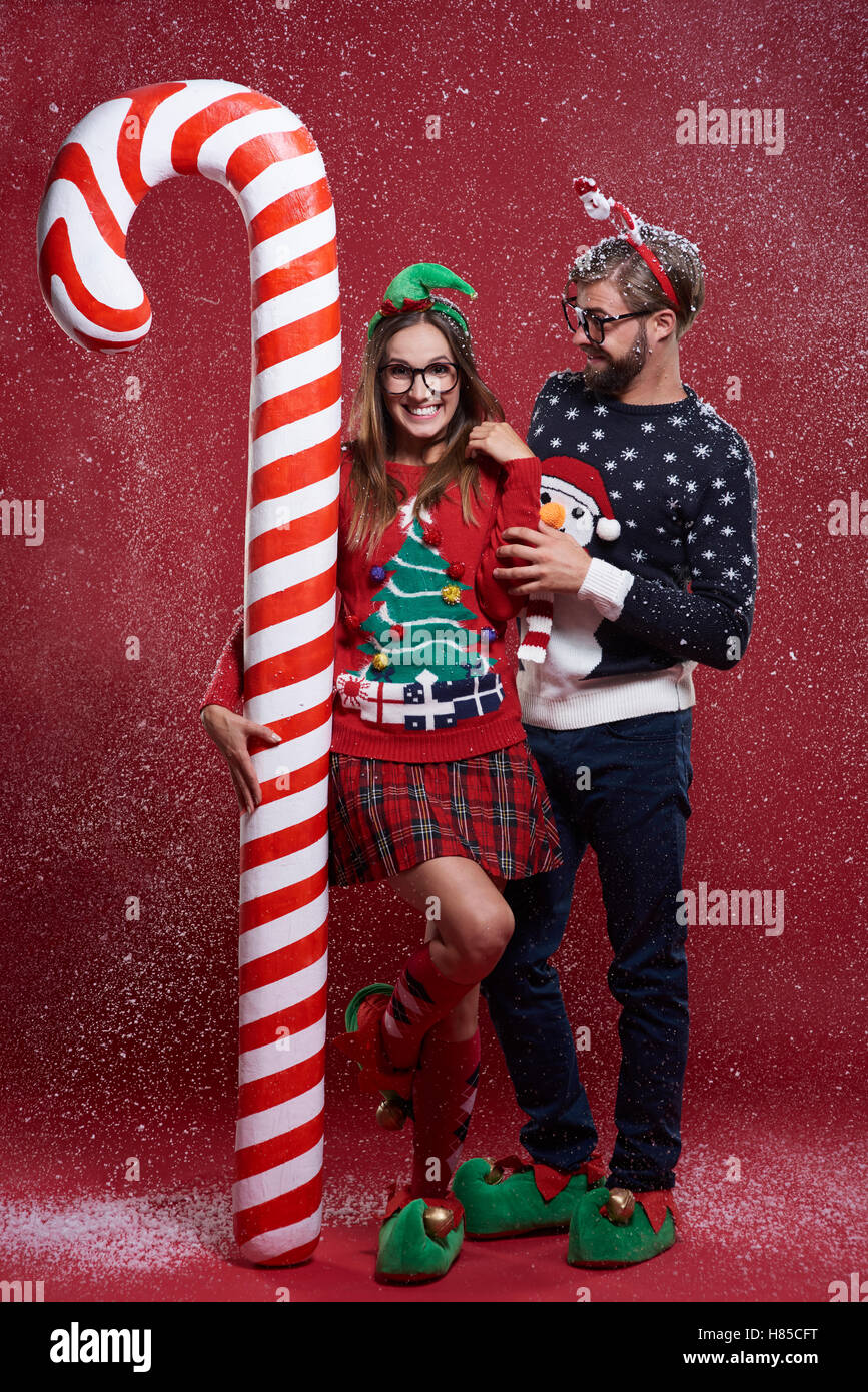 Funny Christmas couple in snow Stock Photo - Alamy