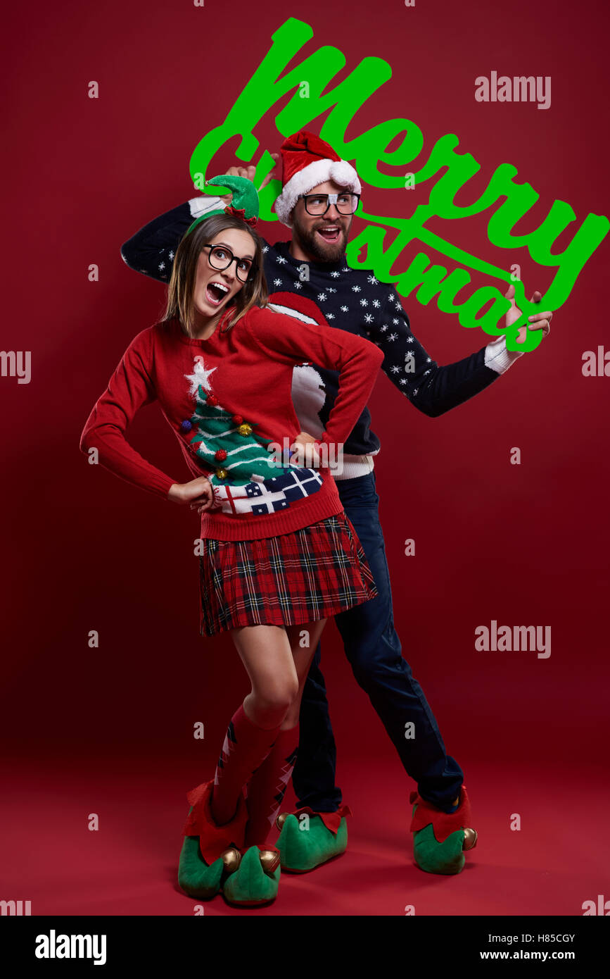 Christmas time with funny couple Stock Photo - Alamy