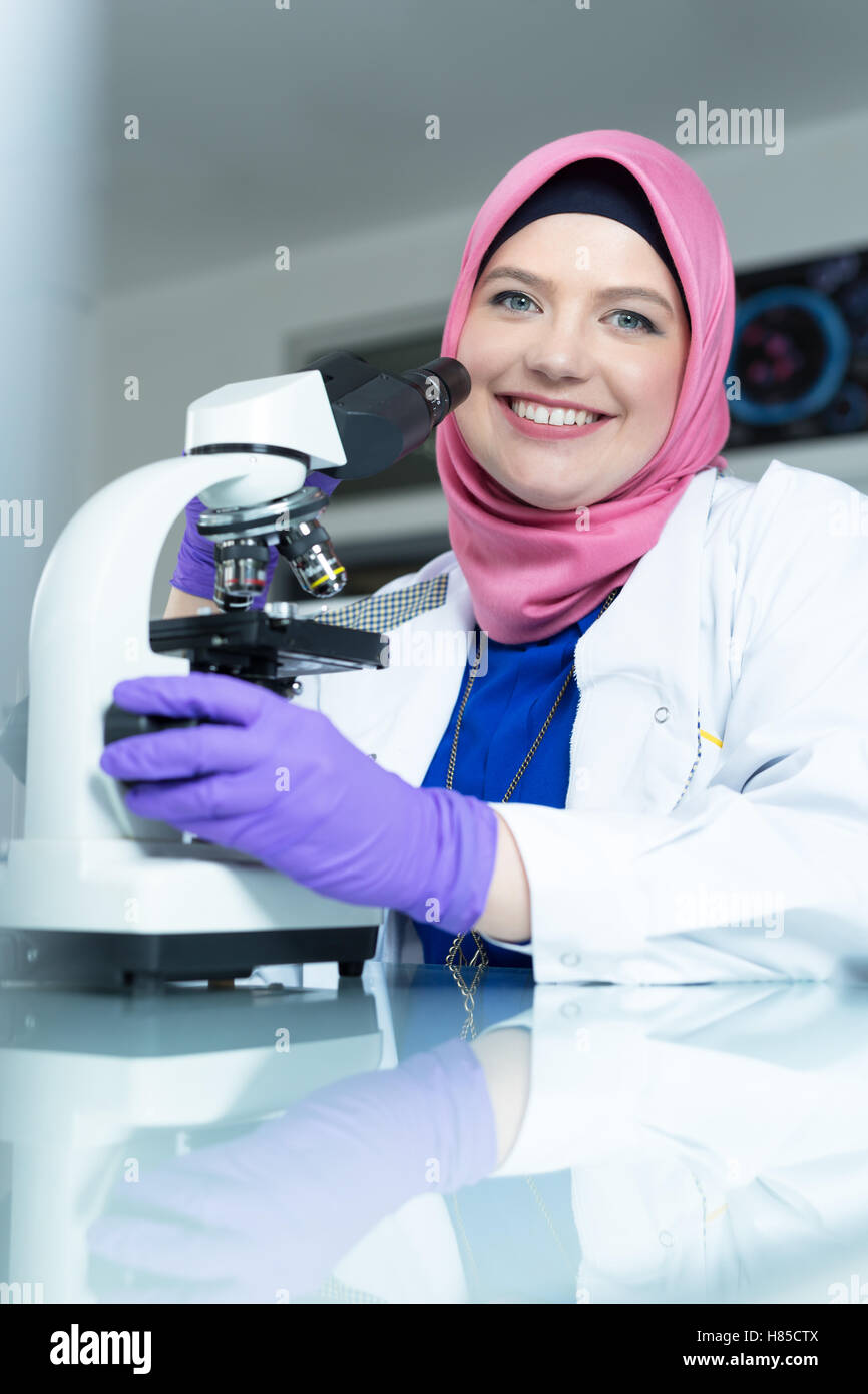 muslim lab worker doing an analysis Stock Photo - Alamy