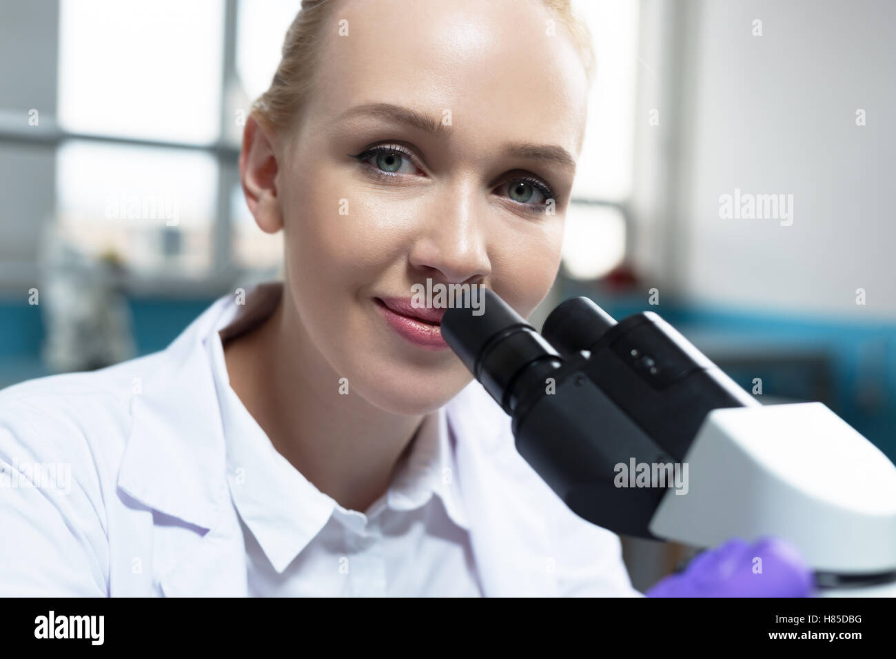 Young pretty girl in the modern laboratory Stock Photo - Alamy